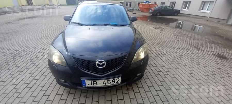 Black Mazda 3 2005 in Riga, with an engine capacity of 1.90 L and mileage of 330 thousand km for 400 €, photo 5 on AUTOMOTO.COM.LV