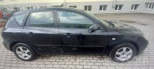 Black Mazda 3 2005 in Riga, with an engine capacity of 1.90 L and mileage of 330 thousand km for 400 €, photo 6 on AUTOMOTO.COM.LV