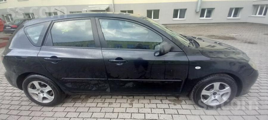 Black Mazda 3 2005 in Riga, with an engine capacity of 1.90 L and mileage of 330 thousand km for 400 €, photo 6 on AUTOMOTO.COM.LV