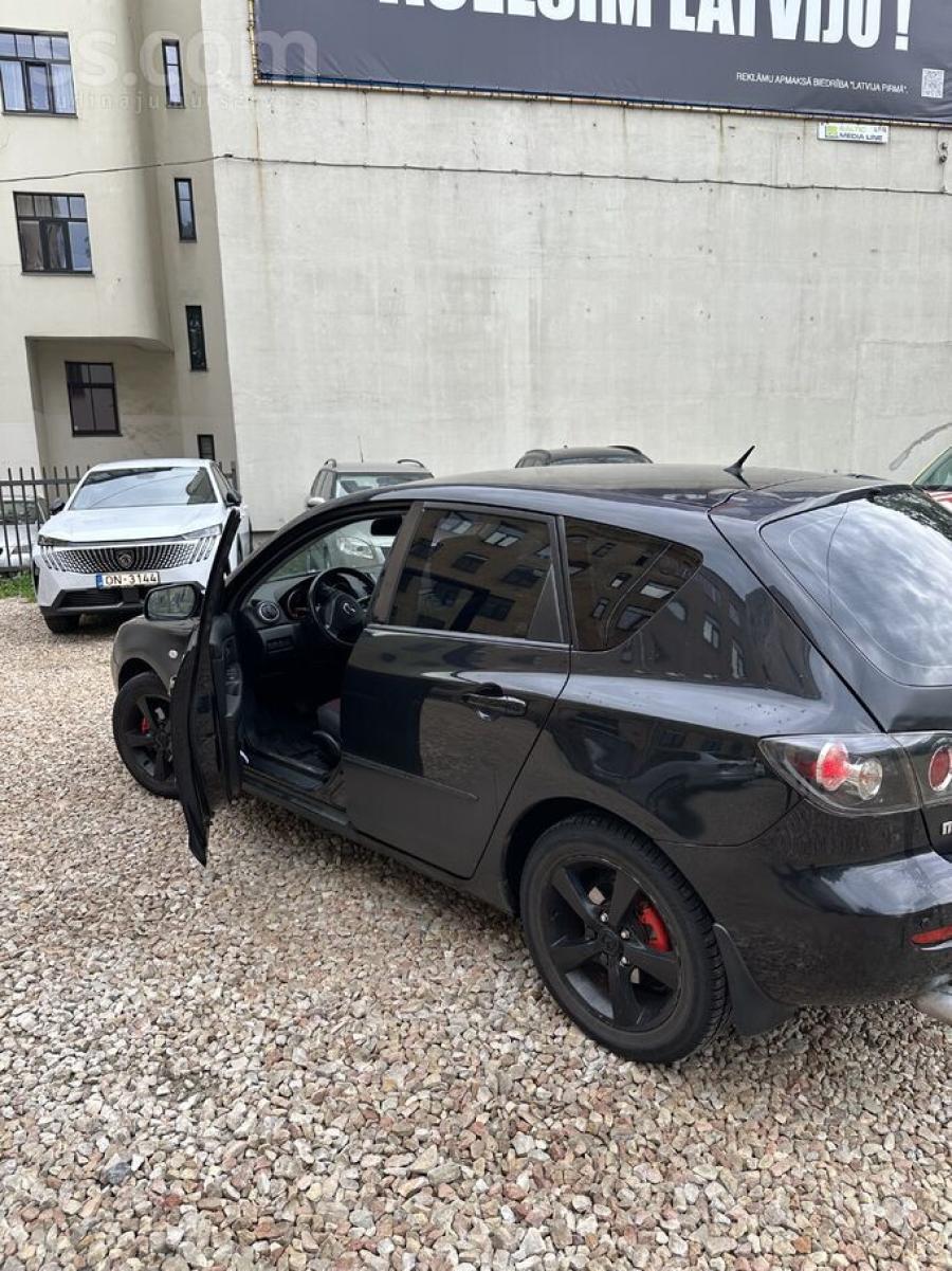 Black Mazda 3 2006 in Riga, with an engine capacity of 1.60 L and mileage of 151 thousand km for 1390 €, photo 8 on AUTOMOTO.COM.LV