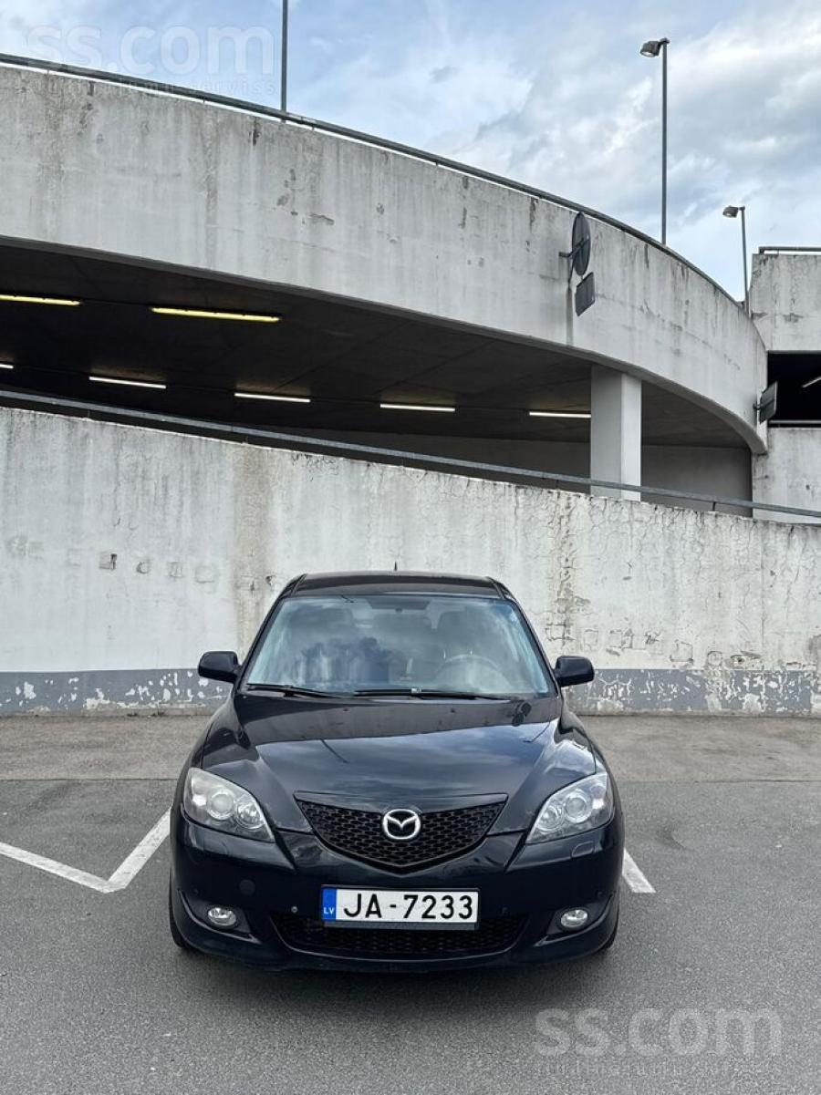Black Mazda 3 2006 in Riga, with an engine capacity of 1.60 L and mileage of 151 thousand km for 1390 €, photo 11 on AUTOMOTO.COM.LV