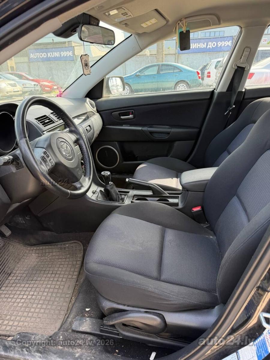 Black Mazda 3 2007 in Tallinn, with an engine capacity of 1.60 L and mileage of 177 thousand km for 499 €, photo 7 on AUTOMOTO.COM.LV