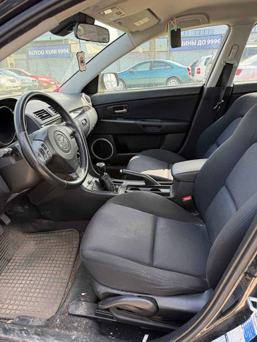 Black Mazda 3 2007 in Tallinn, with an engine capacity of 1.60 L and mileage of 177 thousand km for 399 €, photo 7 on AUTOMOTO.COM.LV