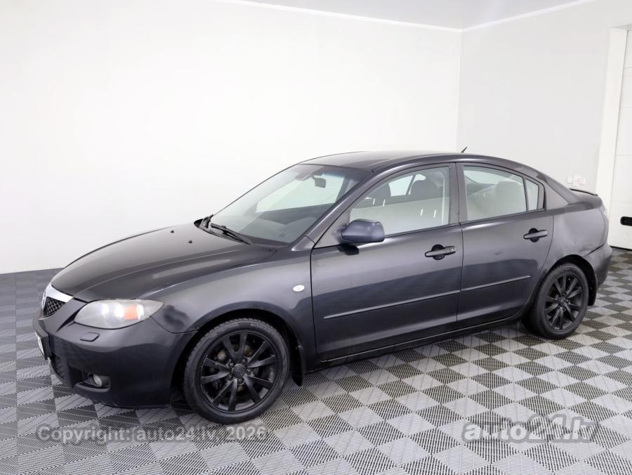 Black Mazda 3 2007 in Tallinn, with an engine capacity of 1.60 L and mileage of 197 thousand km for 899 €, photo 3 on AUTOMOTO.COM.LV