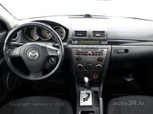 Black Mazda 3 2007 in Tallinn, with an engine capacity of 1.60 L and mileage of 197 thousand km for 899 €, photo 6 on AUTOMOTO.COM.LV