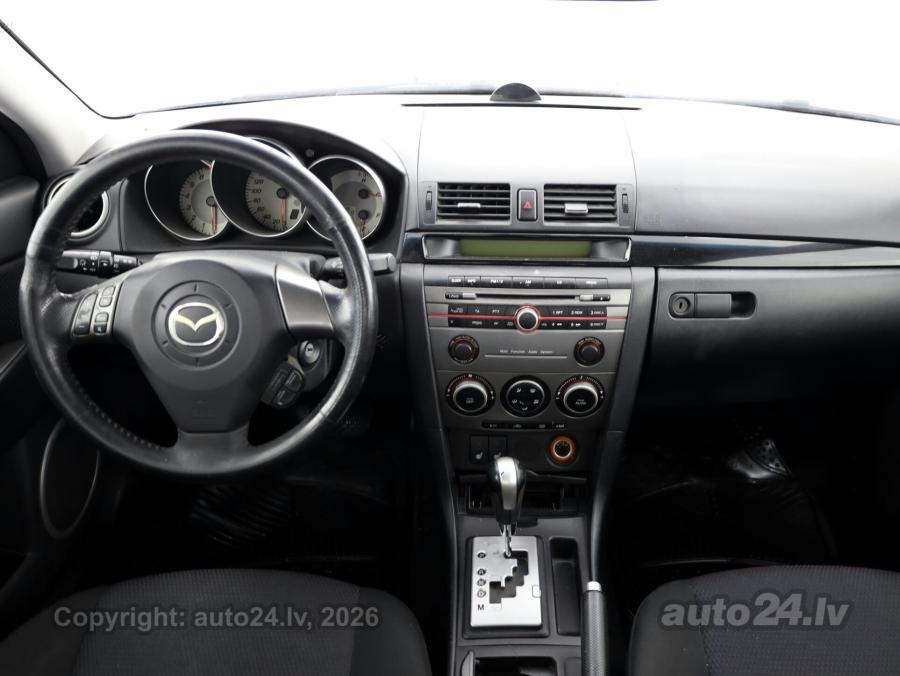 Black Mazda 3 2007 in Tallinn, with an engine capacity of 1.60 L and mileage of 197 thousand km for 899 €, photo 6 on AUTOMOTO.COM.LV