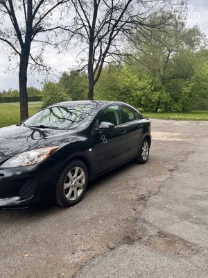 Black Mazda 3 2010 in Vilnius, with an engine capacity of 2.00 L and mileage of 235 thousand km for 3000 €, photo 4 on AUTOMOTO.COM.LV