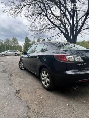Black Mazda 3 2010 in Vilnius, with an engine capacity of 2.00 L and mileage of 235 thousand km for 3000 €, photo 6 on AUTOMOTO.COM.LV