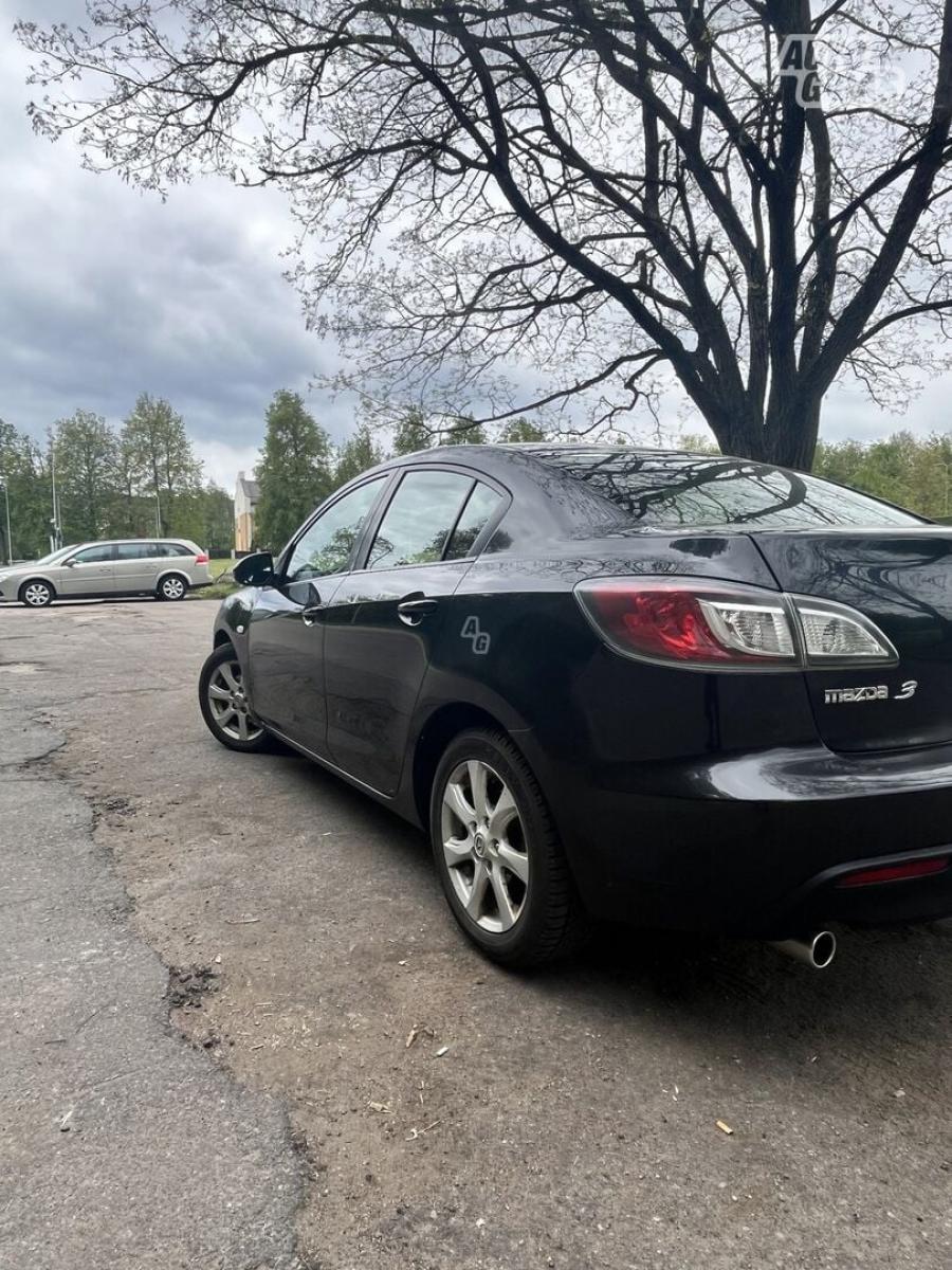 Black Mazda 3 2010 in Vilnius, with an engine capacity of 2.00 L and mileage of 235 thousand km for 3000 €, photo 6 on AUTOMOTO.COM.LV