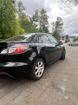 Black Mazda 3 2010 in Vilnius, with an engine capacity of 2.00 L and mileage of 235 thousand km for 3000 €, photo 7 on AUTOMOTO.COM.LV