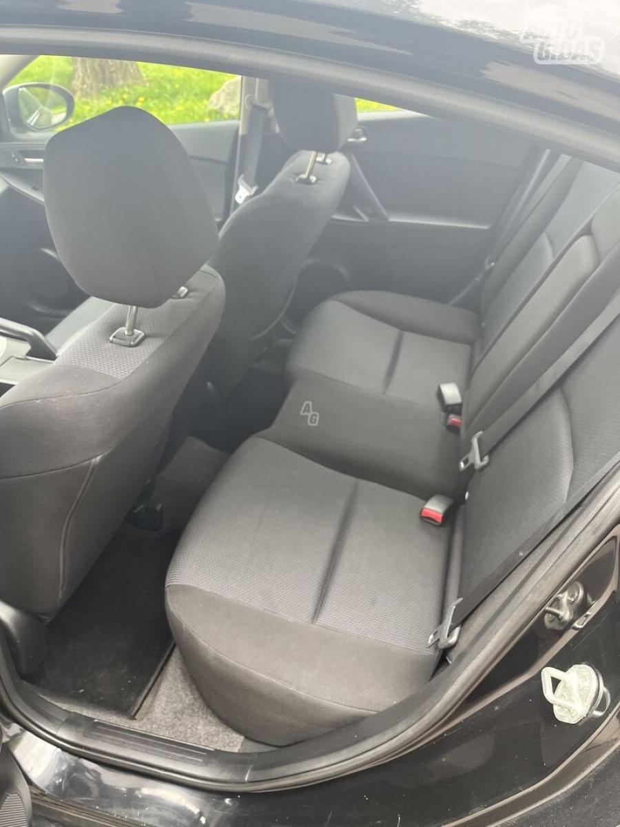 Black Mazda 3 2010 in Vilnius, with an engine capacity of 2.00 L and mileage of 235 thousand km for 3000 €, photo 11 on AUTOMOTO.COM.LV