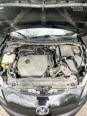 Black Mazda 3 2010 in Vilnius, with an engine capacity of 2.00 L and mileage of 235 thousand km for 3000 €, photo 13 on AUTOMOTO.COM.LV