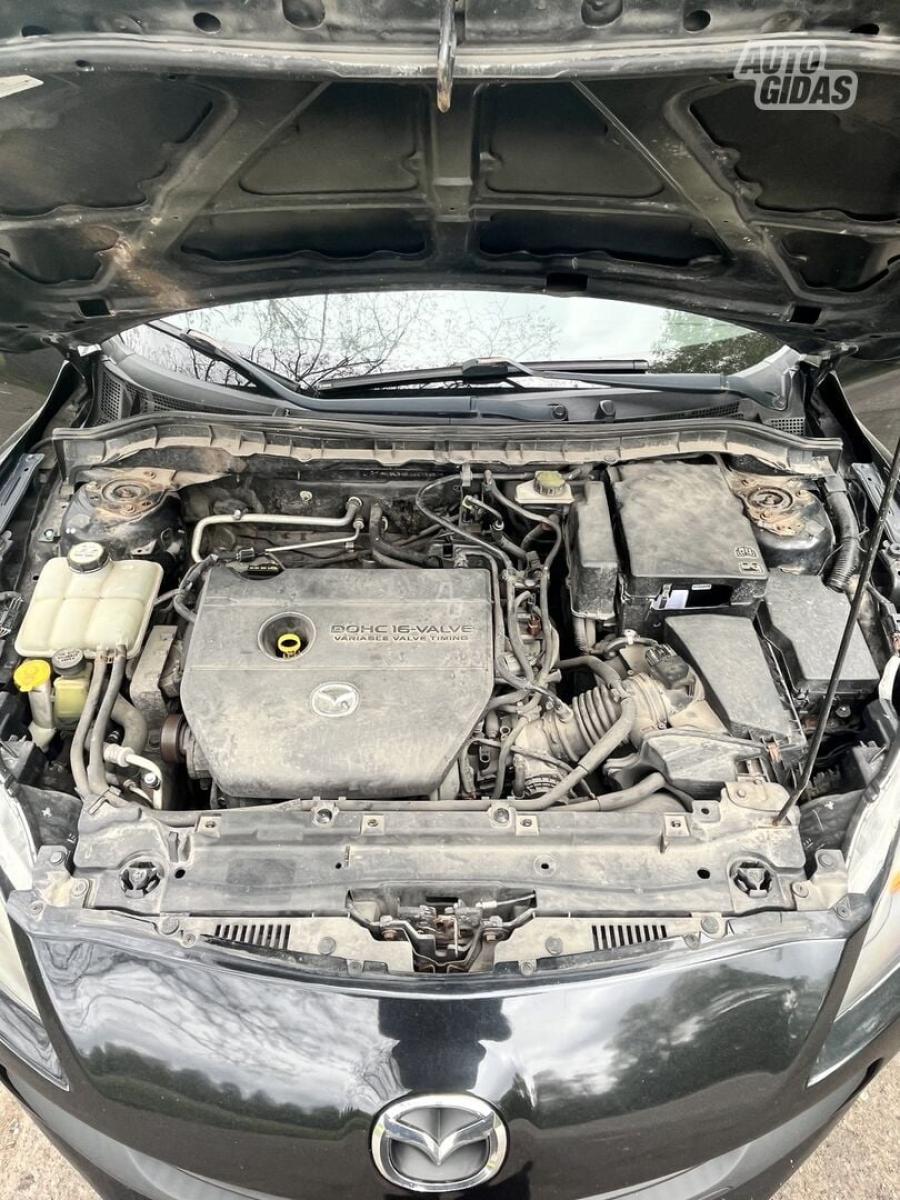 Black Mazda 3 2010 in Vilnius, with an engine capacity of 2.00 L and mileage of 235 thousand km for 3000 €, photo 13 on AUTOMOTO.COM.LV
