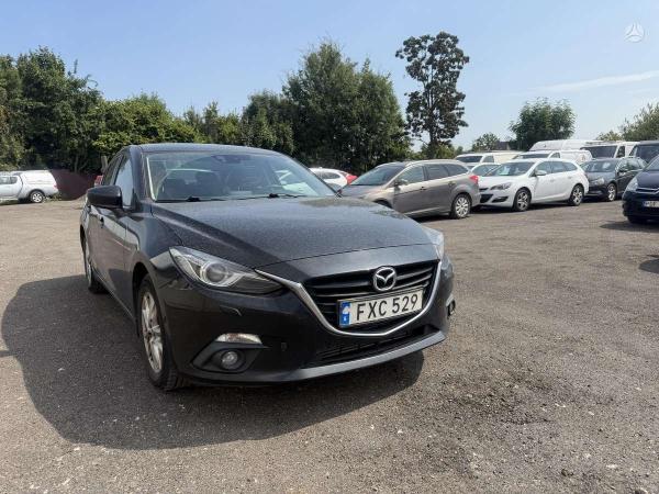 Black Mazda 3 2014 in Kaunas, with an engine capacity of 2.19 L and mileage of 258 thousand km for 2950 €, photo 3 on AUTOMOTO.COM.LV