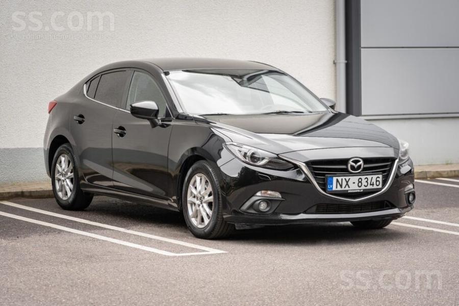 Black Mazda 3 2015 in Riga, with an engine capacity of 2.20 L and mileage of 271 thousand km for 4990 €, photo 4 on AUTOMOTO.COM.LV