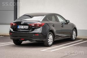 Black Mazda 3 2015 in Riga, with an engine capacity of 2.20 L and mileage of 271 thousand km for 4990 €, photo 5 on AUTOMOTO.COM.LV