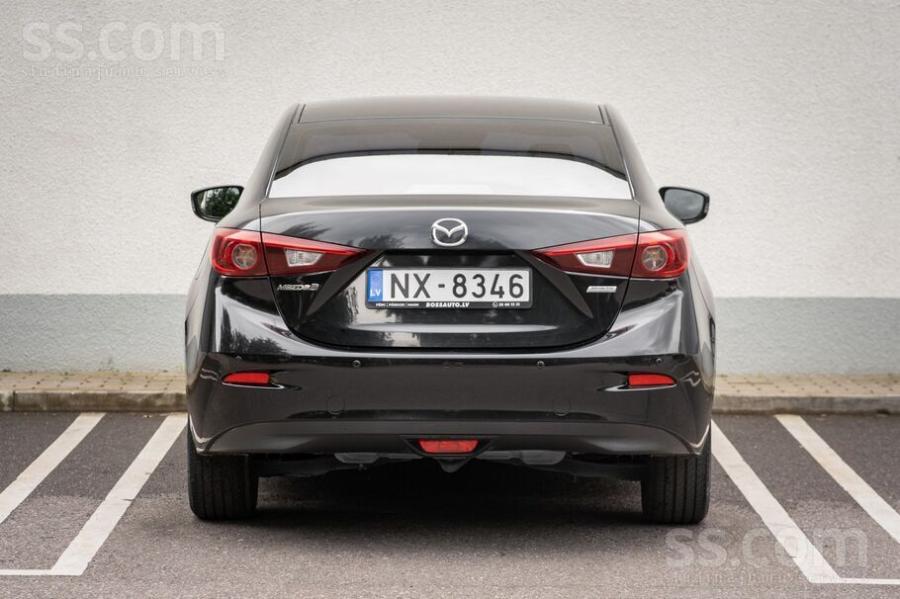 Black Mazda 3 2015 in Riga, with an engine capacity of 2.20 L and mileage of 271 thousand km for 4990 €, photo 6 on AUTOMOTO.COM.LV
