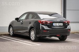 Black Mazda 3 2015 in Riga, with an engine capacity of 2.20 L and mileage of 271 thousand km for 4990 €, photo 7 on AUTOMOTO.COM.LV