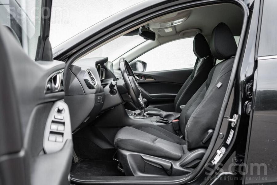 Black Mazda 3 2015 in Riga, with an engine capacity of 2.20 L and mileage of 271 thousand km for 4990 €, photo 10 on AUTOMOTO.COM.LV