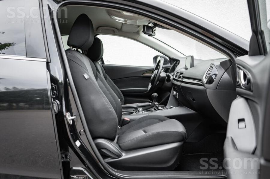 Black Mazda 3 2015 in Riga, with an engine capacity of 2.20 L and mileage of 271 thousand km for 4990 €, photo 11 on AUTOMOTO.COM.LV