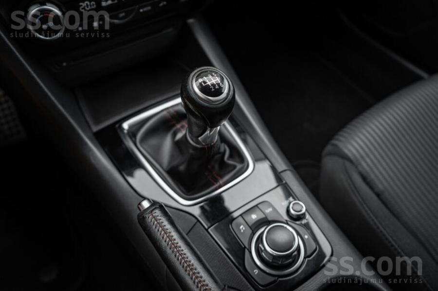 Black Mazda 3 2015 in Riga, with an engine capacity of 2.20 L and mileage of 271 thousand km for 4990 €, photo 23 on AUTOMOTO.COM.LV