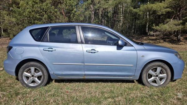 Blue Mazda 3 2007 in Kaunas, with an engine capacity of 1.56 L and mileage of 247 thousand km for 800 €, photo 5 on AUTOMOTO.COM.LV