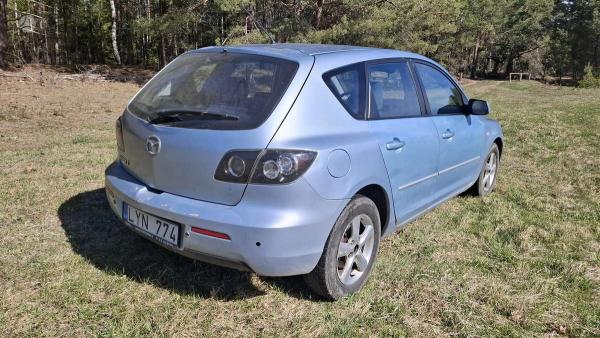 Blue Mazda 3 2007 in Kaunas, with an engine capacity of 1.56 L and mileage of 247 thousand km for 800 €, photo 6 on AUTOMOTO.COM.LV