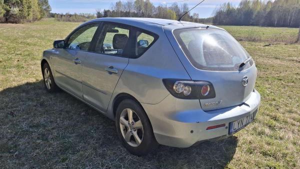 Blue Mazda 3 2007 in Kaunas, with an engine capacity of 1.56 L and mileage of 247 thousand km for 800 €, photo 8 on AUTOMOTO.COM.LV