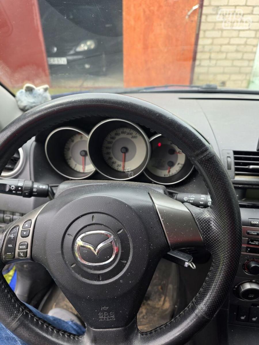 Синий Мазда 3 2008 в Ионава, объемом двигателя 1.60 л и пробегом 304 тыс. км за 700 €, фото 7 на AUTOMOTO.COM.LV