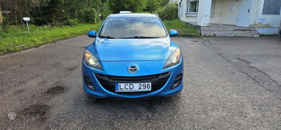 Blue Mazda 3 2010 in Vilnius, with an engine capacity of 1.56 L and mileage of 192 thousand km for 1499 €, photo 3 on AUTOMOTO.COM.LV