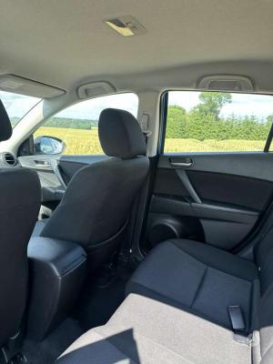 Blue Mazda 3 2010 in Kelme, with an engine capacity of 1.56 L and mileage of 220 thousand km for 3700 €, photo 8 on AUTOMOTO.COM.LV