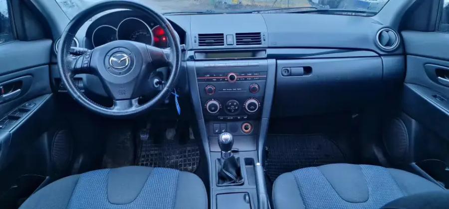 Blue Mazda 3 2005 in Valmiera, with an engine capacity of 1.60 L and mileage of 176 thousand km for 1150 €, photo 8 on AUTOMOTO.COM.LV