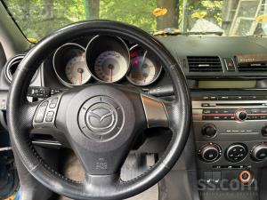 Blue Mazda 3 2006 in Riga, with an engine capacity of 1.60 L and mileage of 251 thousand km for 700 €, photo 9 on AUTOMOTO.COM.LV