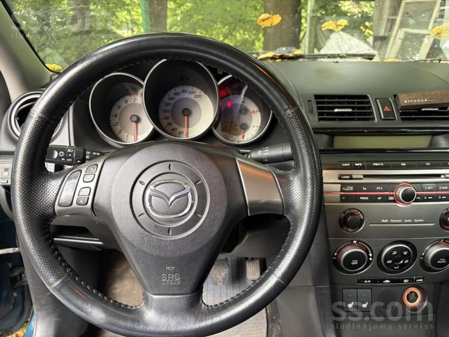 Blue Mazda 3 2006 in Riga, with an engine capacity of 1.60 L and mileage of 251 thousand km for 700 €, photo 9 on AUTOMOTO.COM.LV