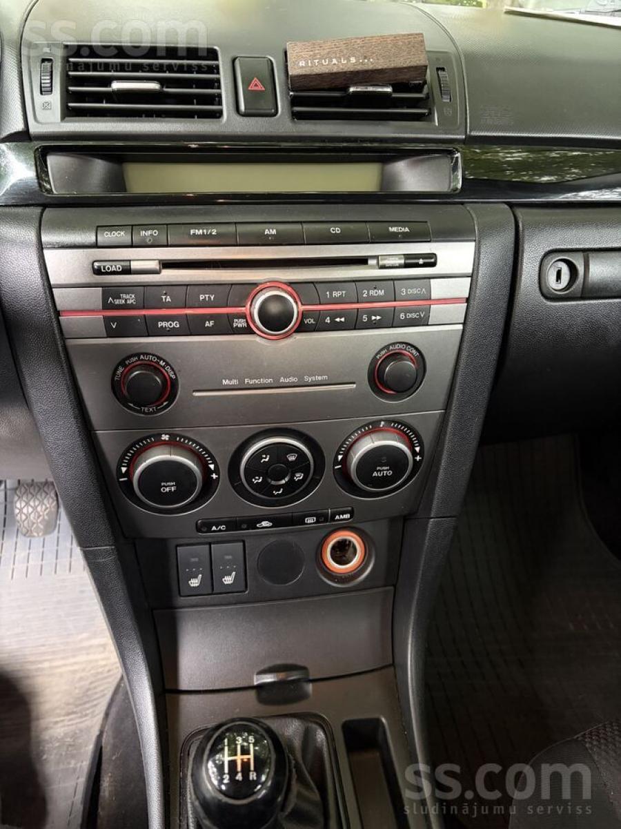 Blue Mazda 3 2006 in Riga, with an engine capacity of 1.60 L and mileage of 251 thousand km for 700 €, photo 10 on AUTOMOTO.COM.LV