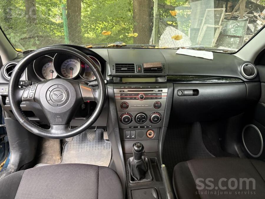 Blue Mazda 3 2006 in Riga, with an engine capacity of 1.60 L and mileage of 251 thousand km for 700 €, photo 12 on AUTOMOTO.COM.LV