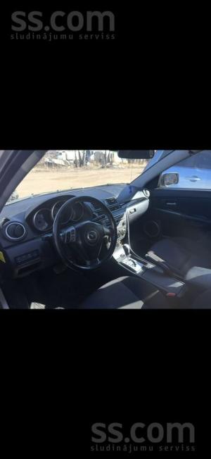 Brown Mazda 3 2007 in Riga, with an engine capacity of 1.60 L and mileage of 246 thousand km for 690 €, photo 5 on AUTOMOTO.COM.LV