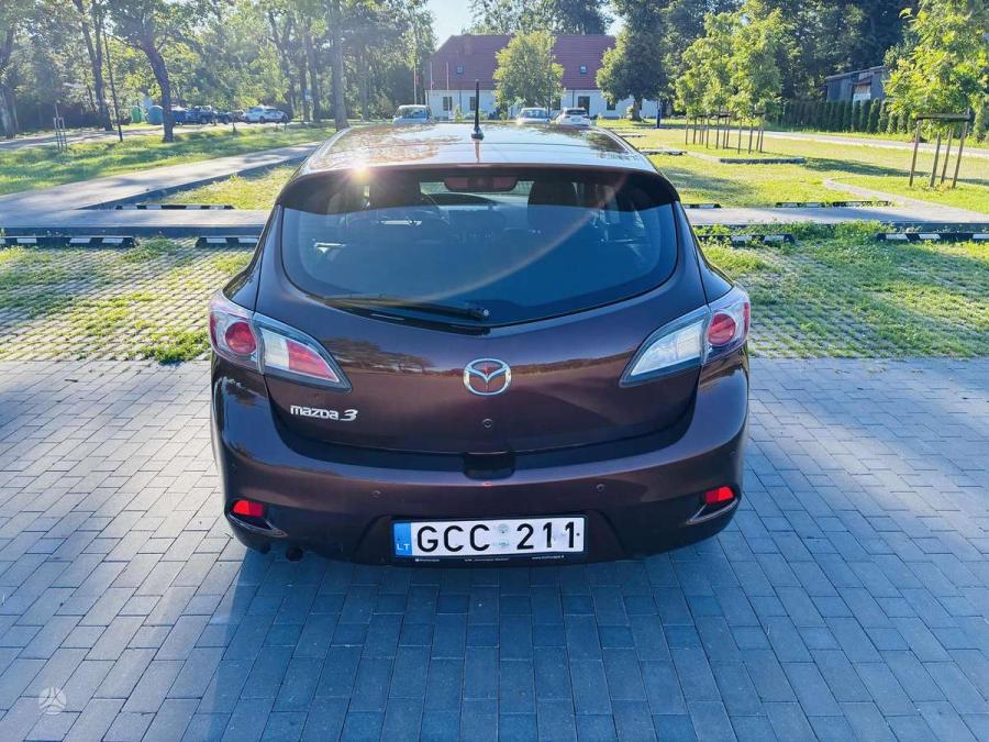 Brown Mazda 3 2012 in Kaunas, with an engine capacity of 1.60 L and mileage of 109 thousand km for 4999 €, photo 3 on AUTOMOTO.COM.LV