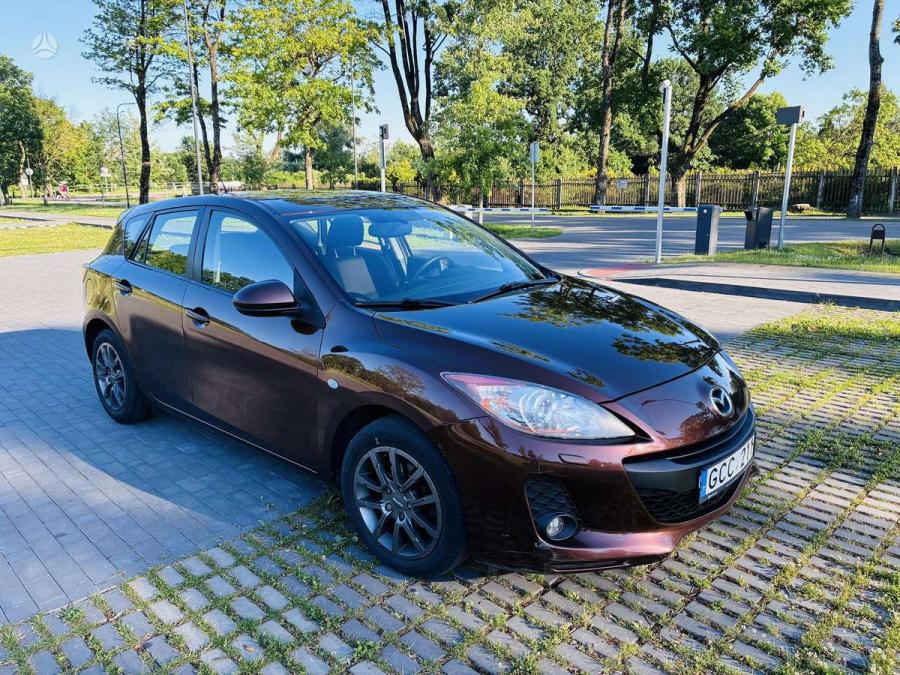 Brown Mazda 3 2012 in Kaunas, with an engine capacity of 1.60 L and mileage of 109 thousand km for 4999 €, photo 7 on AUTOMOTO.COM.LV