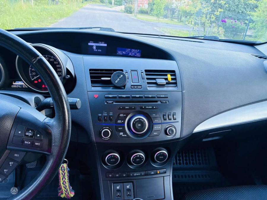 Brown Mazda 3 2012 in Kaunas, with an engine capacity of 1.60 L and mileage of 109 thousand km for 4999 €, photo 13 on AUTOMOTO.COM.LV