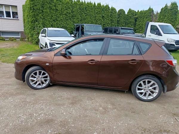 Brown Mazda 3 2012 in Marijampole, with an engine capacity of 2.00 L and mileage of 198 thousand km for 3249 €, photo 7 on AUTOMOTO.COM.LV