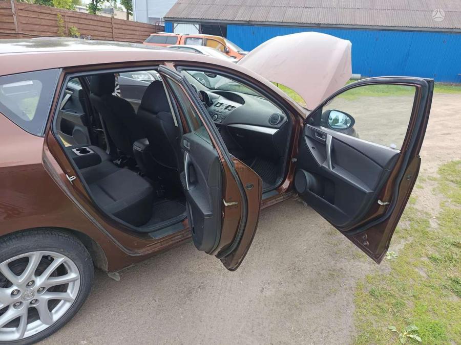 Brūns Mazda 3 2012 Marijampole, ar dzinēja tilpumu 2.00 L un nobraukumu 198 tūkst. km par 3249 €, foto 15 vietnē AUTOMOTO.COM.LV