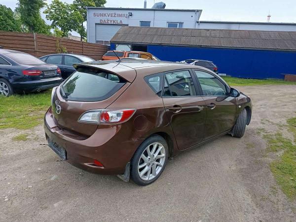 Brown Mazda 3 2012 in Marijampole, with an engine capacity of 2.00 L and mileage of 198 thousand km for 3149 €, photo 4 on AUTOMOTO.COM.LV