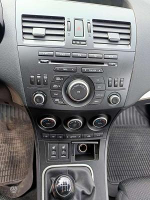 Brown Mazda 3 2012 in Marijampole, with an engine capacity of 2.00 L and mileage of 198 thousand km for 3149 €, photo 21 on AUTOMOTO.COM.LV