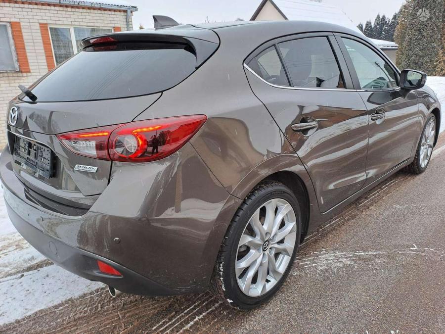 Brown Mazda 3 2014 in Prienai, with an engine capacity of 2.19 L and mileage of 142 thousand km for 7300 €, photo 4 on AUTOMOTO.COM.LV