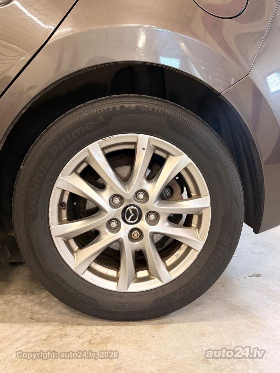 Brown Mazda 3 2014 in Tallinn, with an engine capacity of 2.20 L and mileage of 166 thousand km for 8300 €, photo 19 on AUTOMOTO.COM.LV
