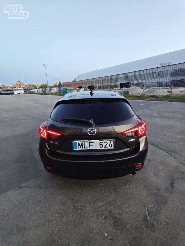 Brown Mazda 3 2015 in Siauliai, with an engine capacity of 1.50 L and mileage of 133 thousand km for 7990 €, photo 5 on AUTOMOTO.COM.LV