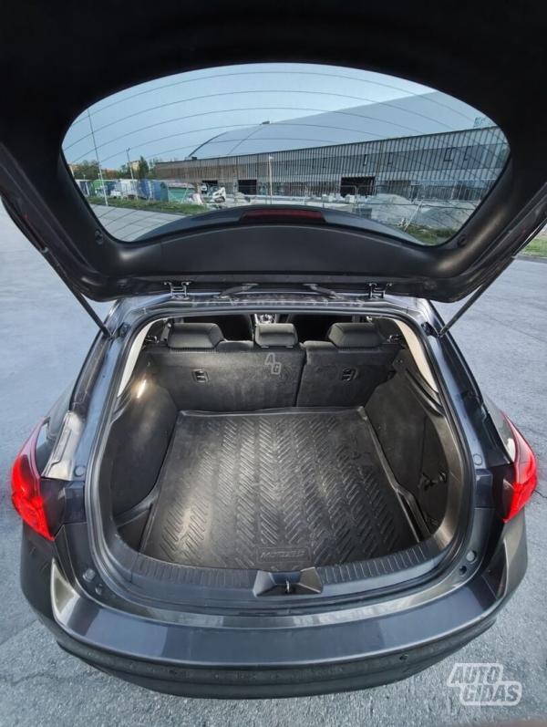 Brown Mazda 3 2015 in Siauliai, with an engine capacity of 1.50 L and mileage of 133 thousand km for 7990 €, photo 7 on AUTOMOTO.COM.LV