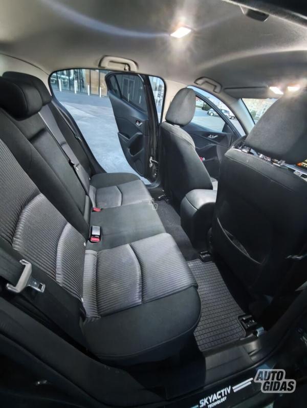 Brown Mazda 3 2015 in Siauliai, with an engine capacity of 1.50 L and mileage of 133 thousand km for 7990 €, photo 8 on AUTOMOTO.COM.LV