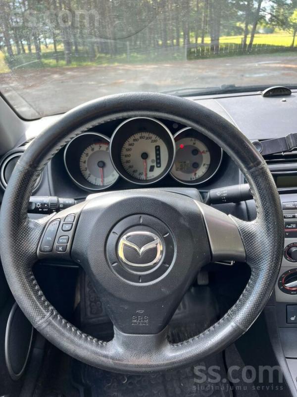 Brown Mazda 3 2007 in Talsi, with an engine capacity of 1.60 L and mileage of 219 thousand km for 950 €, photo 5 on AUTOMOTO.COM.LV